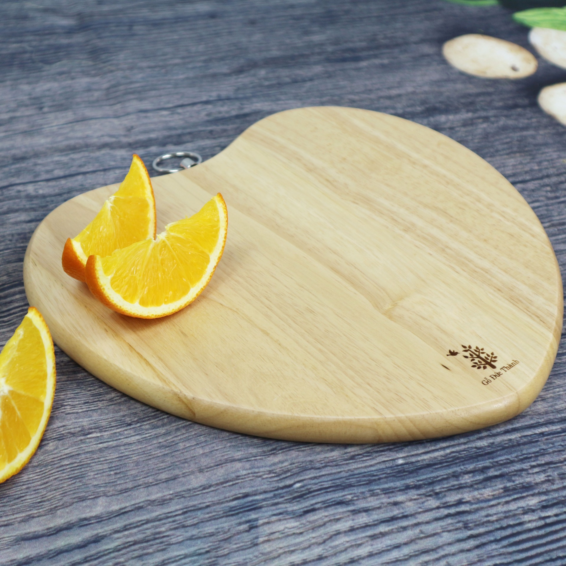 Heart shaped cutting board with rotation ring